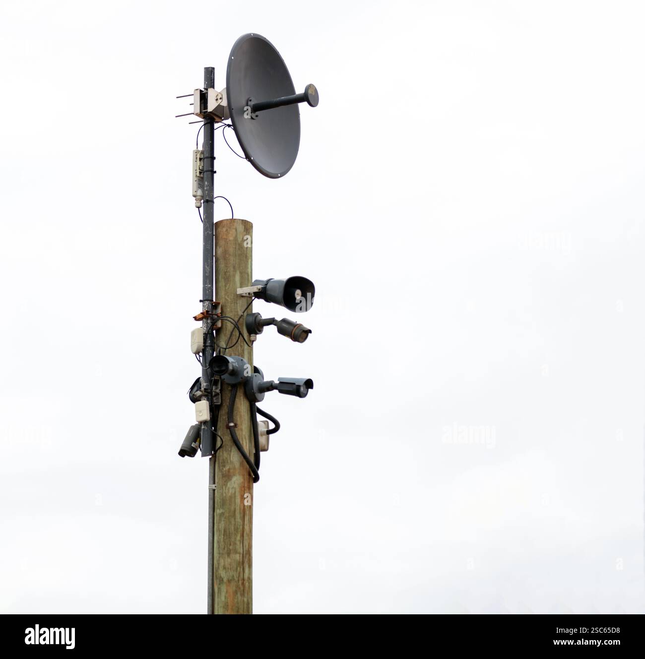 Communication pole with devices for surveillance and public information ...