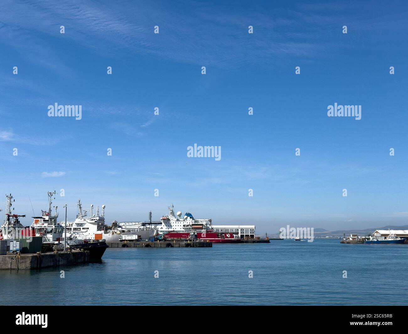 Cape town harbor, South Africa. Ships anchored on the ports docks ...