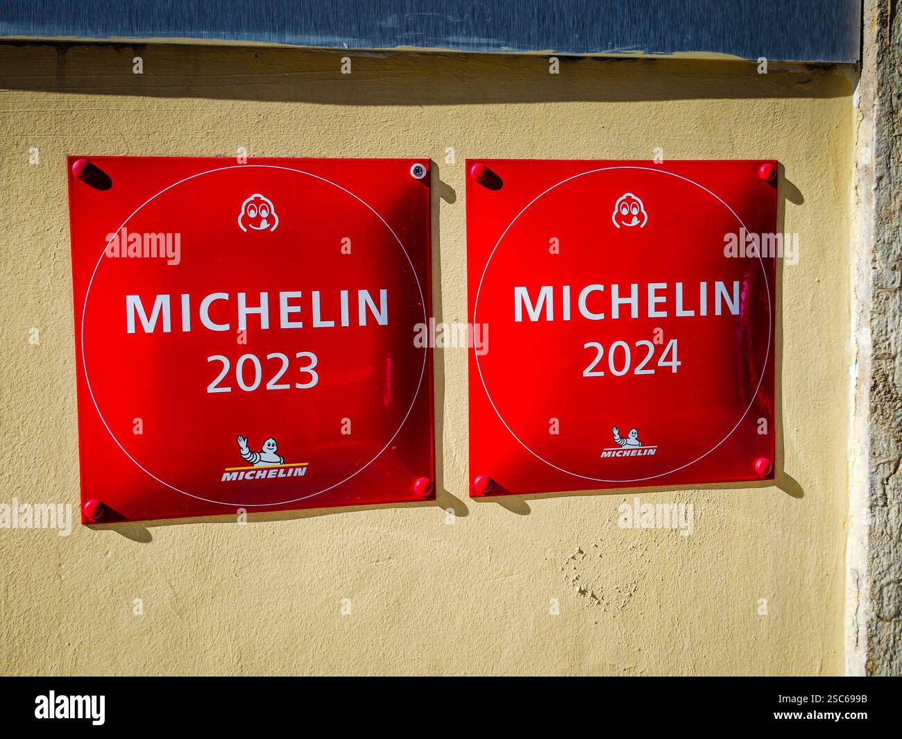 Lisbon, Portugal - 02 05 2025. Michelin Guide 2023 and 2024 plate signs ...