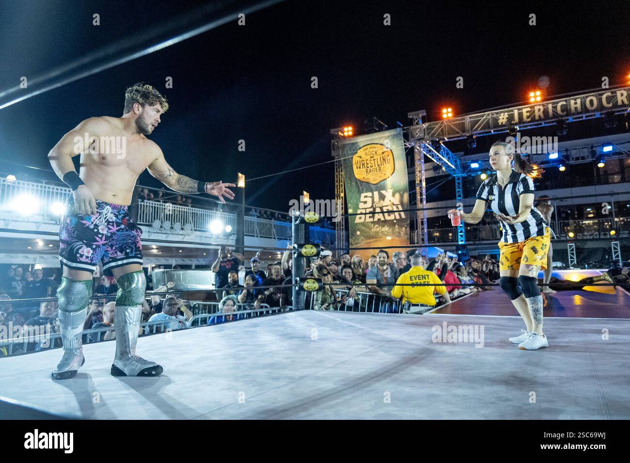 Will Ospreay, left, and Aubrey Edwards are seen during Chris Jericho's ...