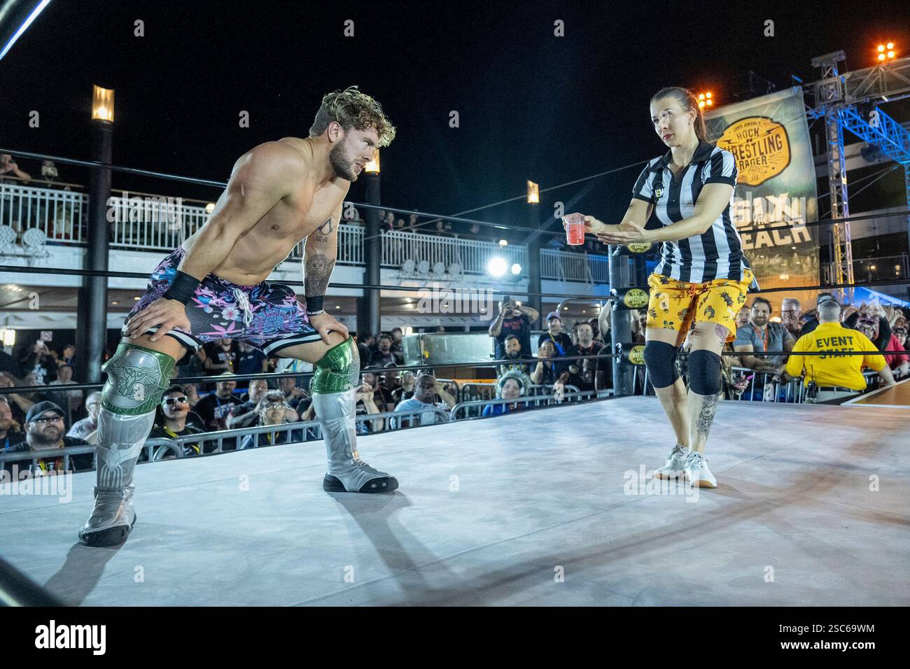 Will Ospreay, left, and Aubrey Edwards are seen during Chris Jericho's ...