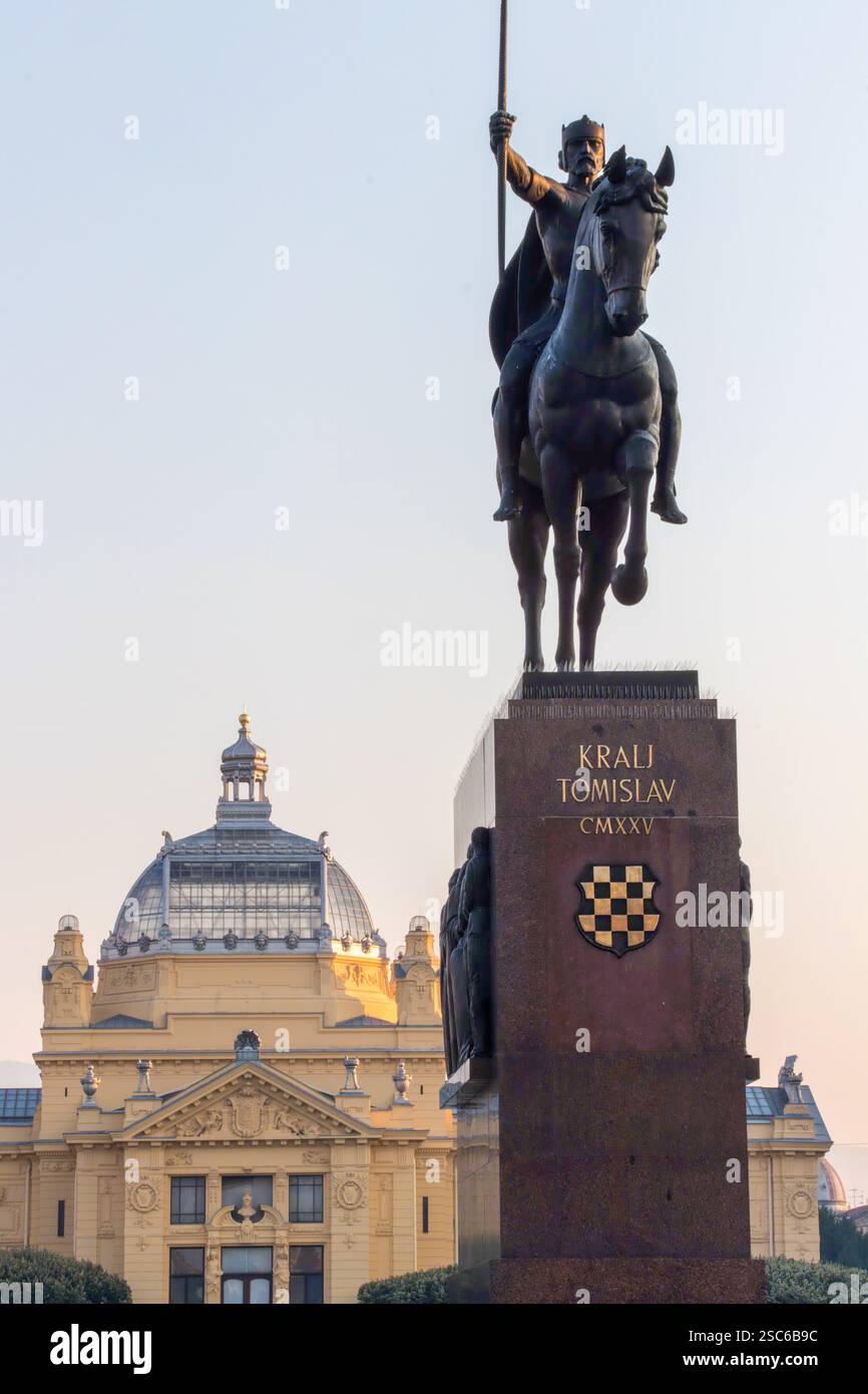 A prominent statue of King Tomislav on horseback, located in front of a ...