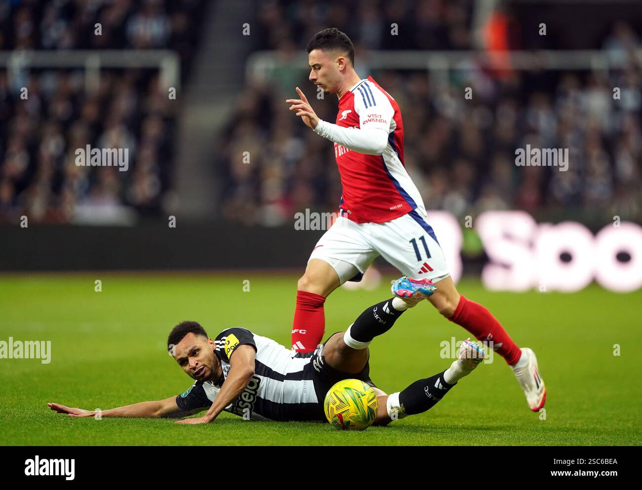 Newcastle United's Jacob Murphy challenges Arsenal's Gabriel Martinelli ...