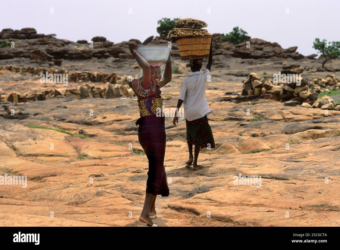Dogon women. Africa. Evils. Dogon Stock Photo - Alamy