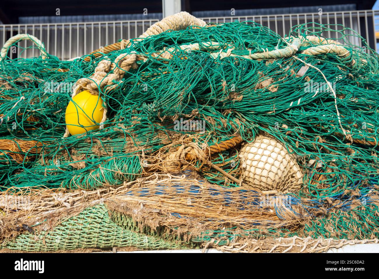 Pile of Fishing Nets and Buoys Stock Photo - Alamy