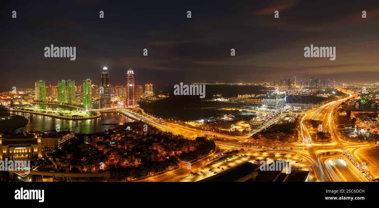 Panoramic aerail view of Lusail express way with Pearl Qatar Porto ...