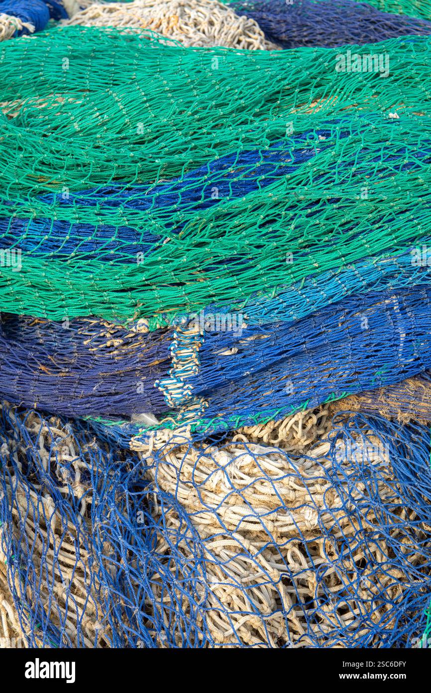 Pile of colorful fishing nets Stock Photo - Alamy