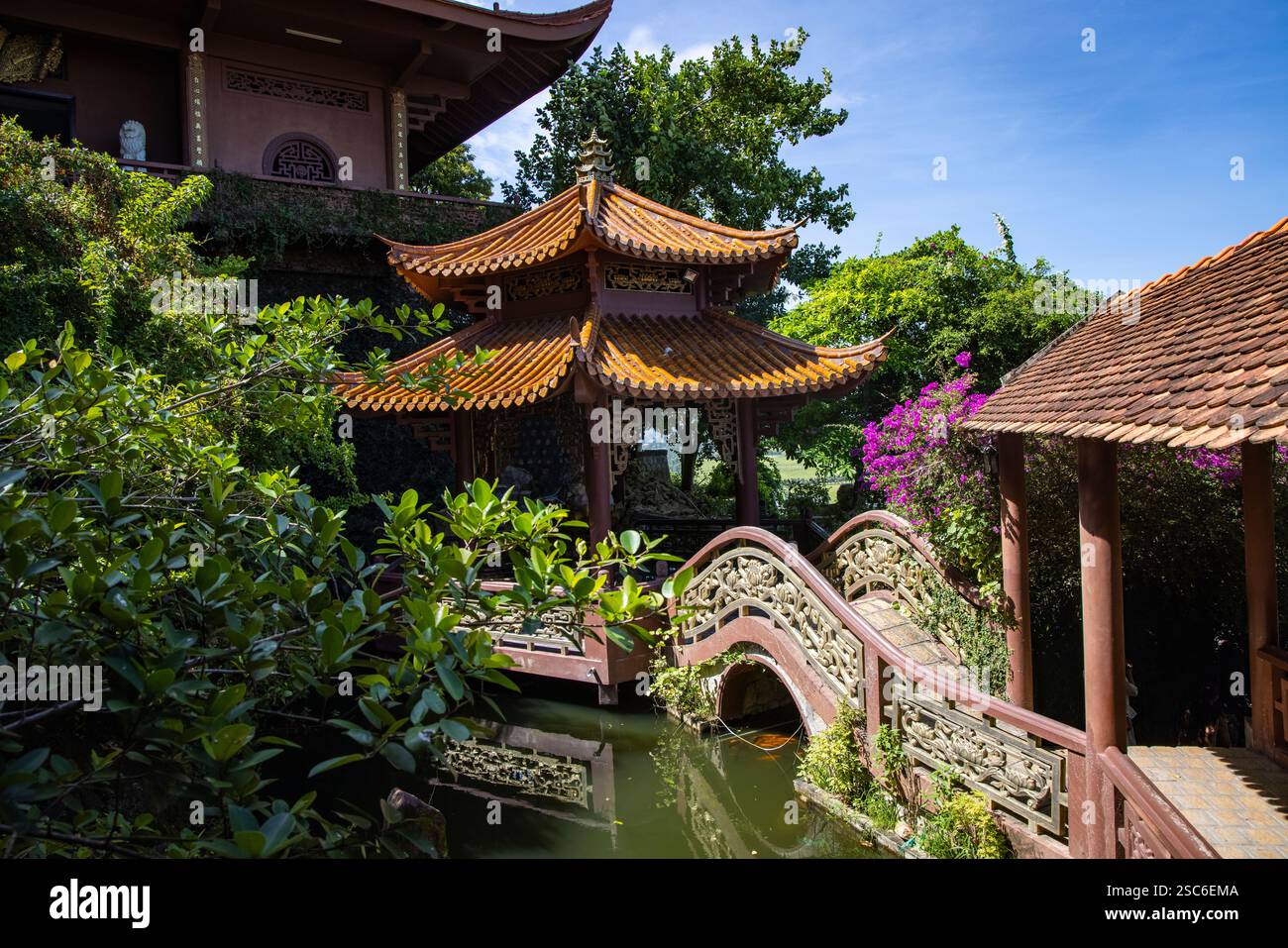 Bridge over pond at the temples of Nui Sam on Mount Sam, Nui Sam, Chau ...