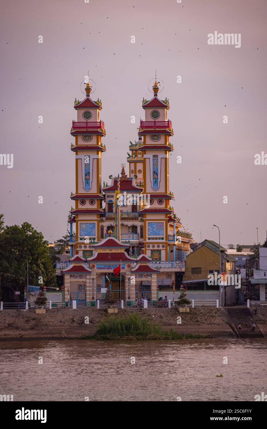 Cao Dai Temple on the Mekong River at sunset, Tan Chau, An Giang ...
