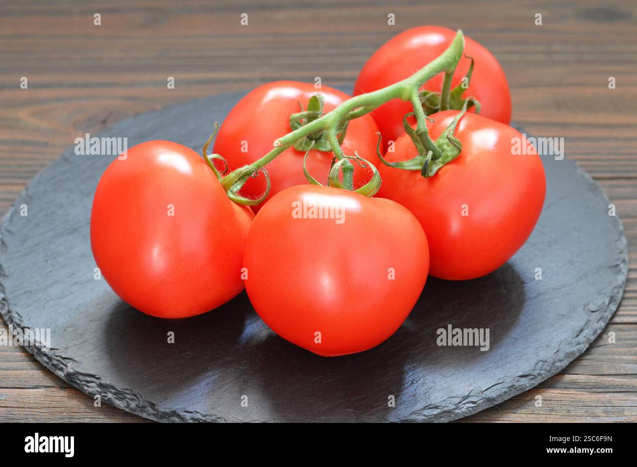 Cluster of tomatoes Stock Photo - Alamy