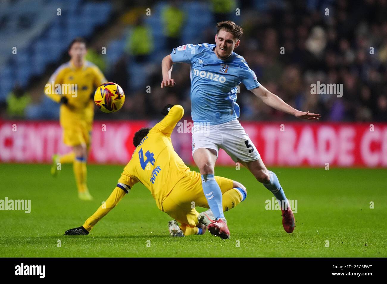 Coventry City's Jack Rudoni (right) is tackled by Leeds United's Ethan ...
