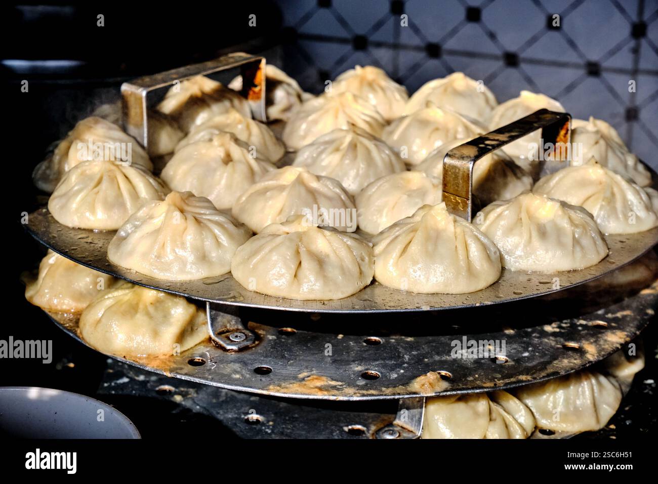 The image shows manty, a traditional dish of Central Asian cuisine ...