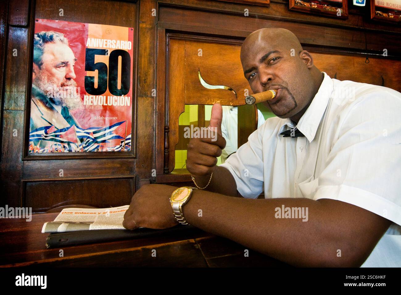 Cuba. Havana. Bar Monserrate. Man Who Smokes A Cigar Stock Photo - Alamy