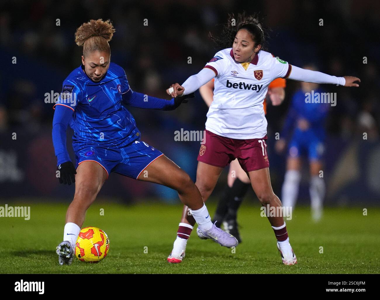 Chelsea's Lauren James (left) and West Ham United's Manuela Pavi battle ...