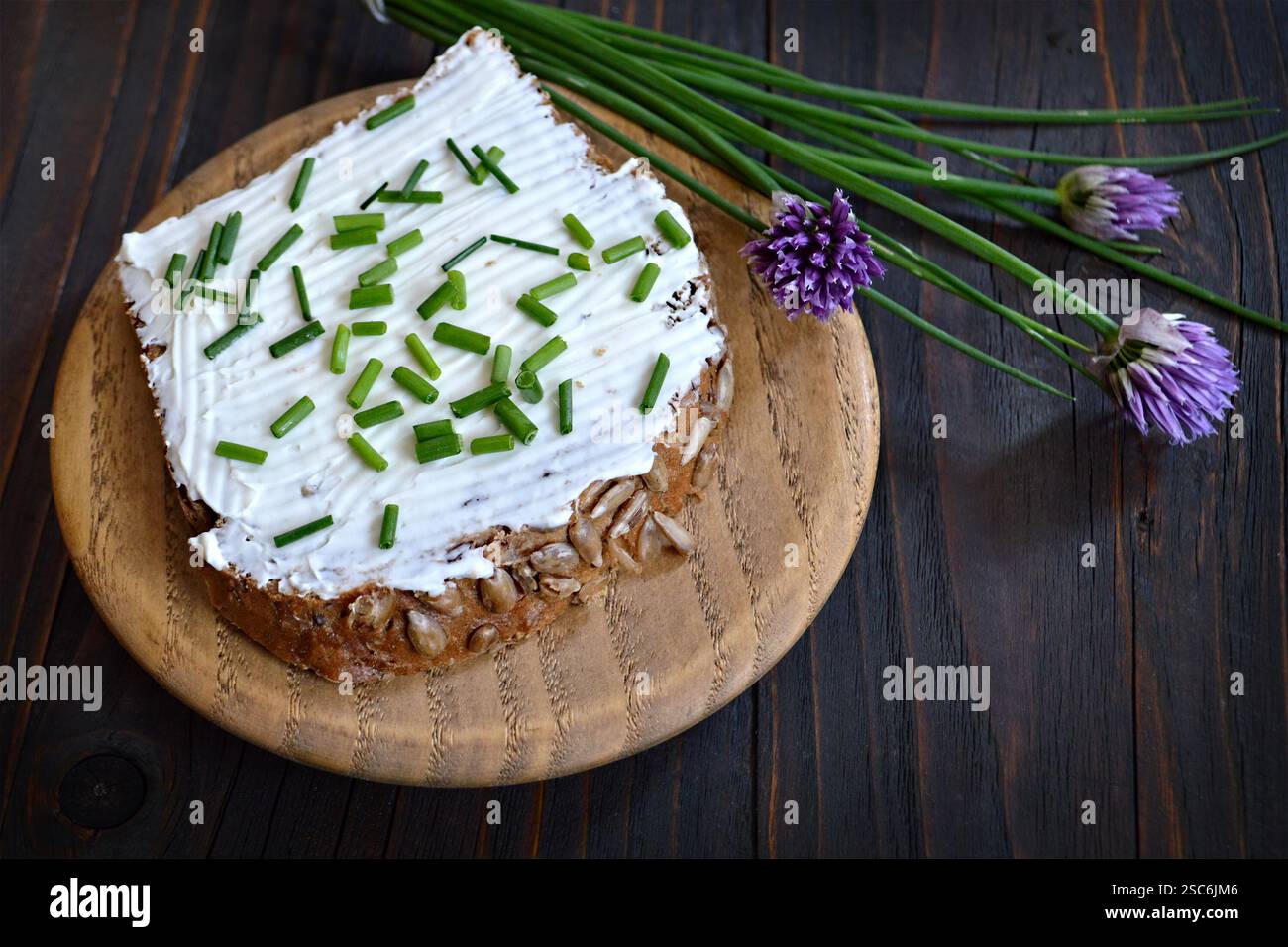 Cottage cheese and chives spread on slice of bread Stock Photo - Alamy