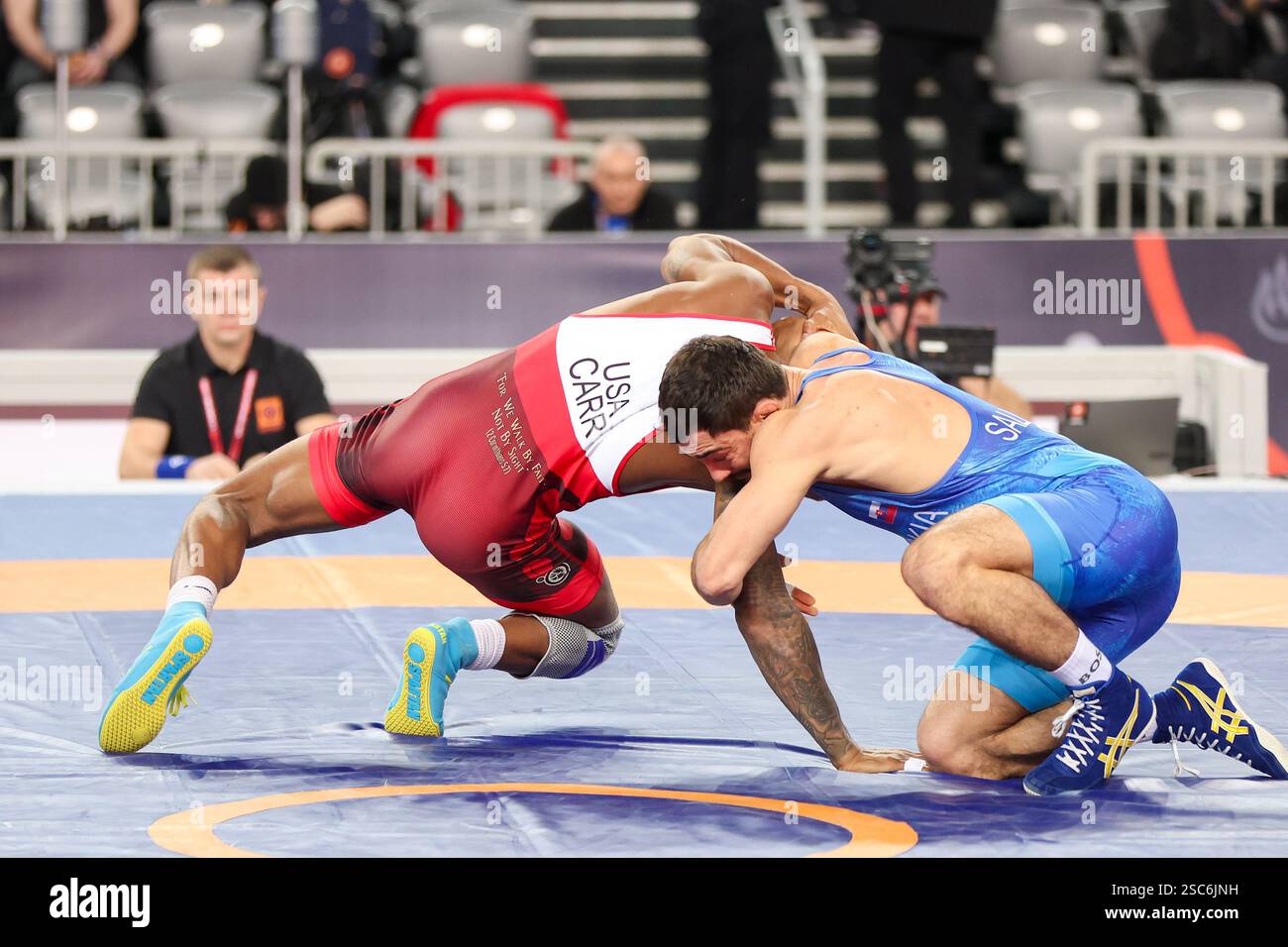 ZAGREB, CROATIA - FEBRUARY 5: David Aaron Carr (red) of USA competes ...