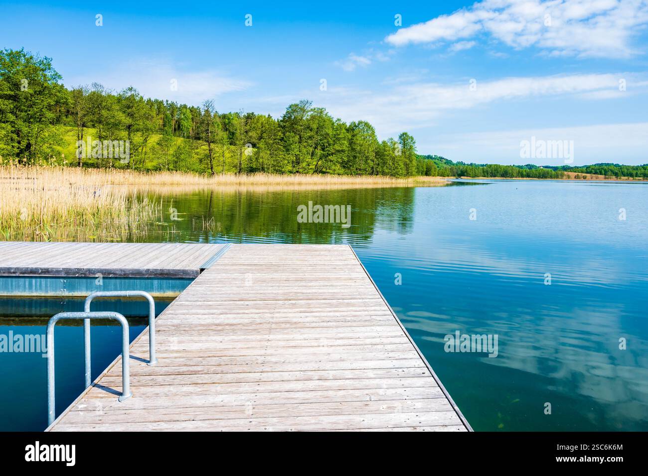 Pier at beautiful lake in Suwalski Landscape Park, Podlasie, Poland ...
