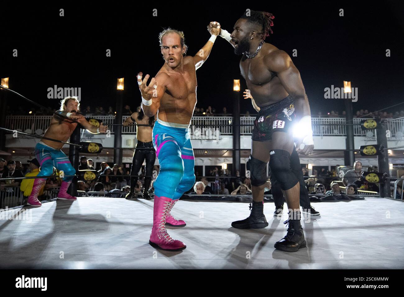 The Outrunners, left, and EJ Nduka are seen during Chris Jericho's Rock ...