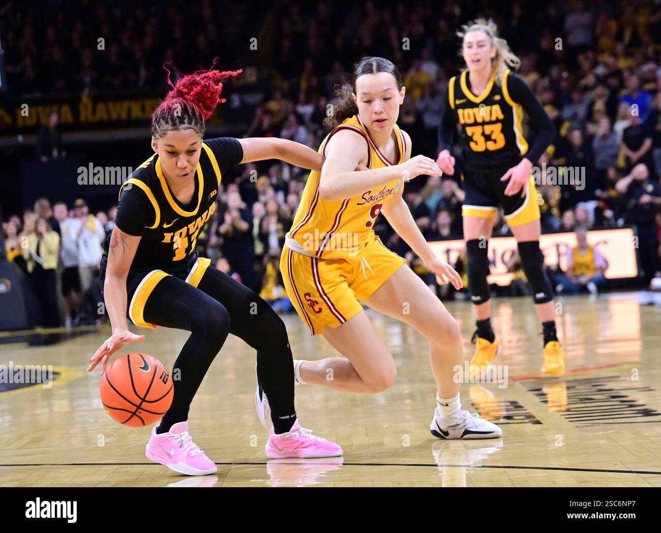 IOWA CITY, IA - FEBRUARY 02: Iowa guard Aaliyah Guyton (11) maintains ...
