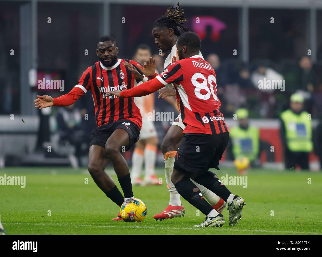 San Siro, Milan, Italy. 05th Feb, 2025. Youssouf Fofana of AC Milan, Kouadio Kone of AS Roma and ...