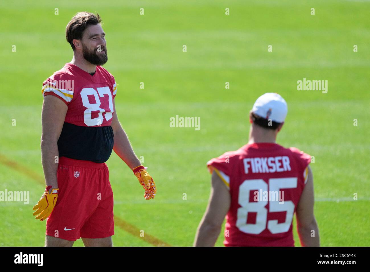 Kansas City Chiefs tight end Travis Kelce (87) talks with tight end ...