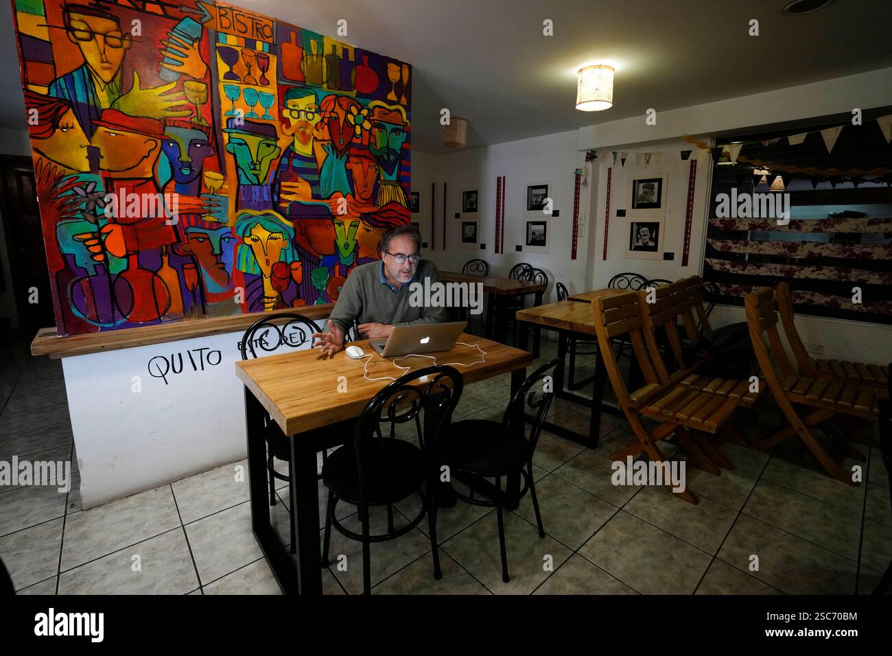 Juan Martin sits inside his restaurant he was obliged to closed due to ...