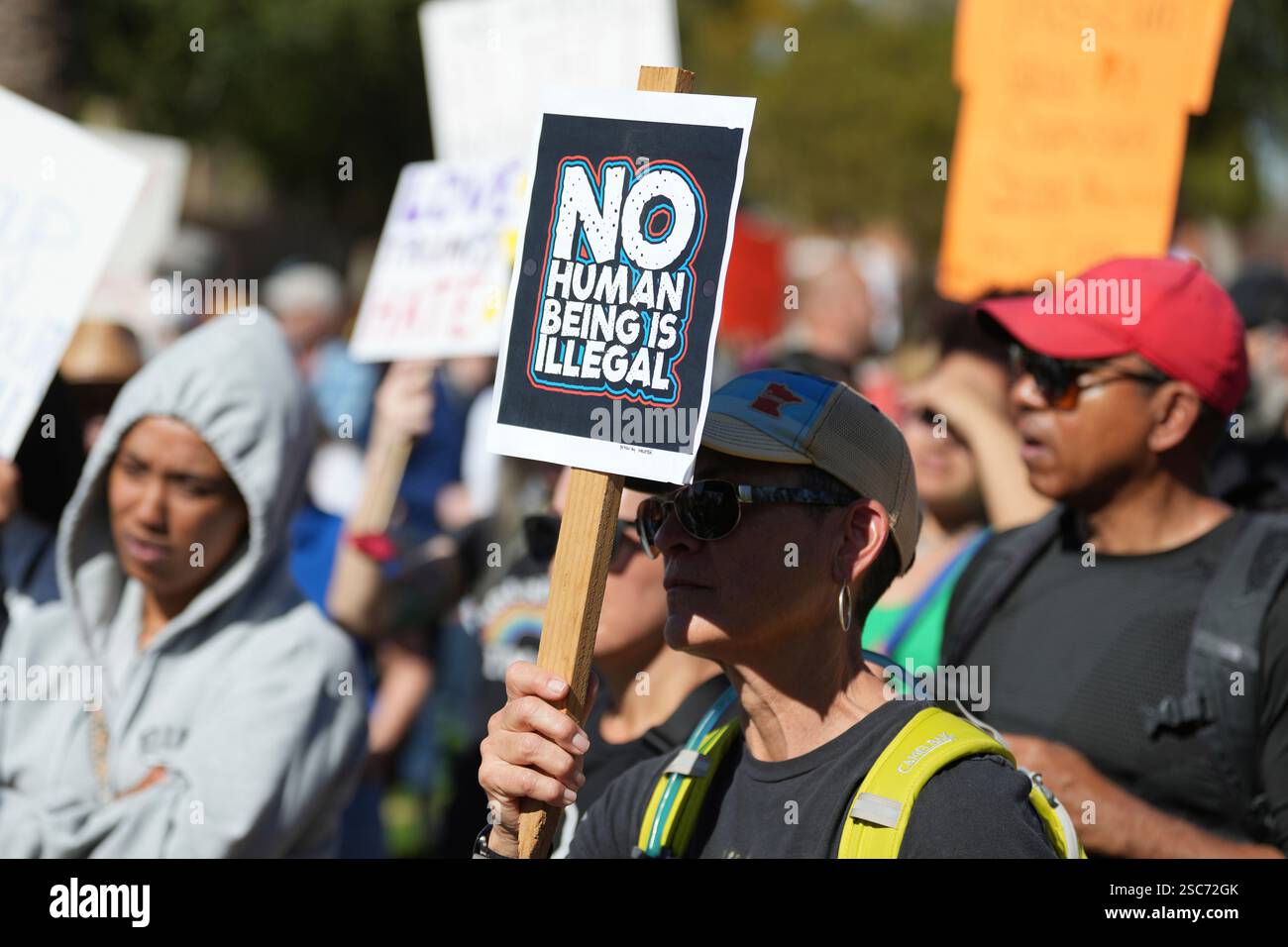 Hundreds gather for a political protest at the Arizona Capitol ...