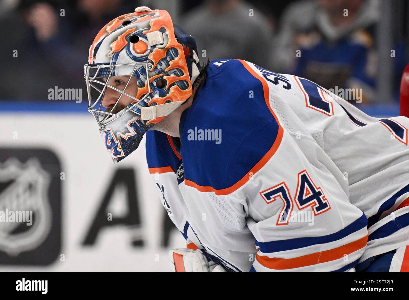 Edmonton Oilers' Stuart Skinner (74) watches on during an NHL hockey ...