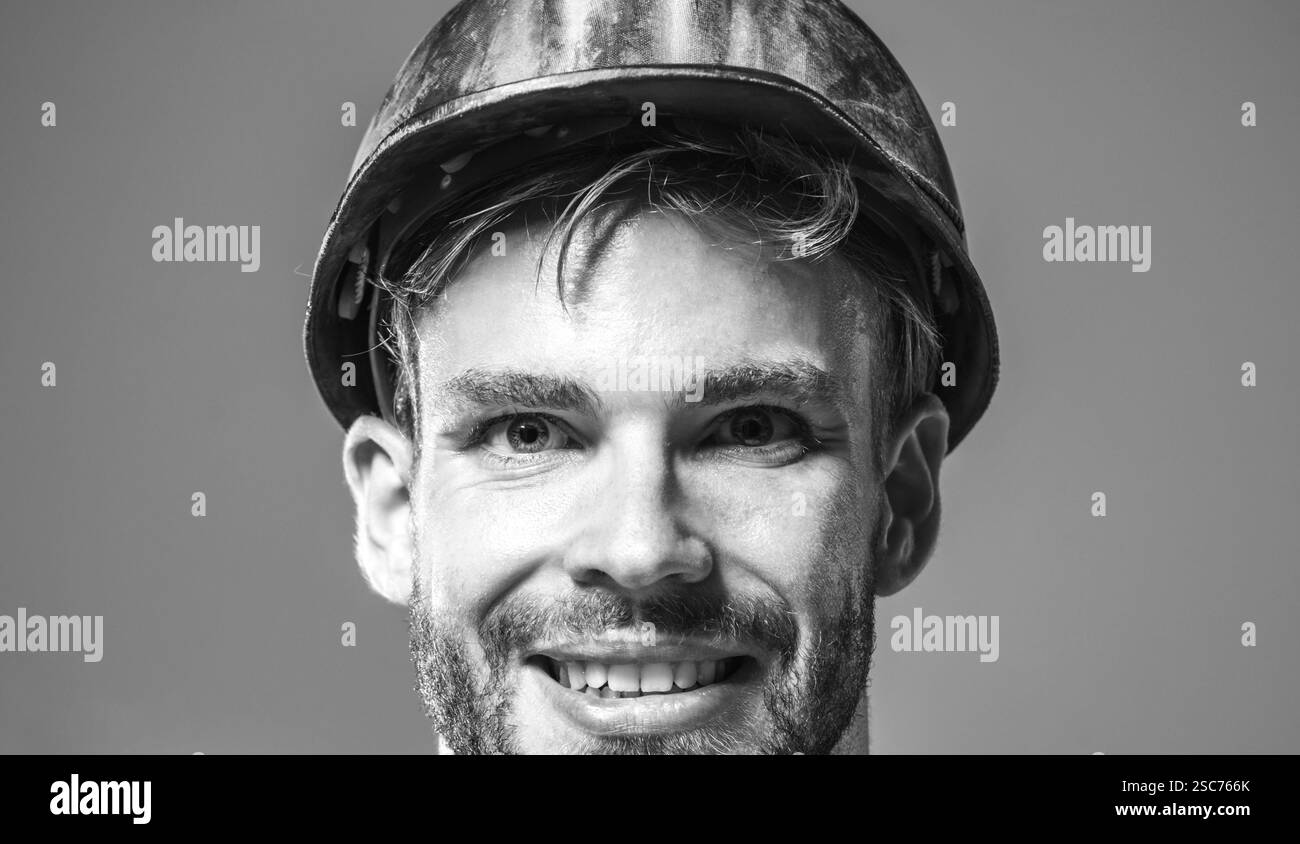 Smiling male builder in Black and White Stock Photos & Images - Alamy