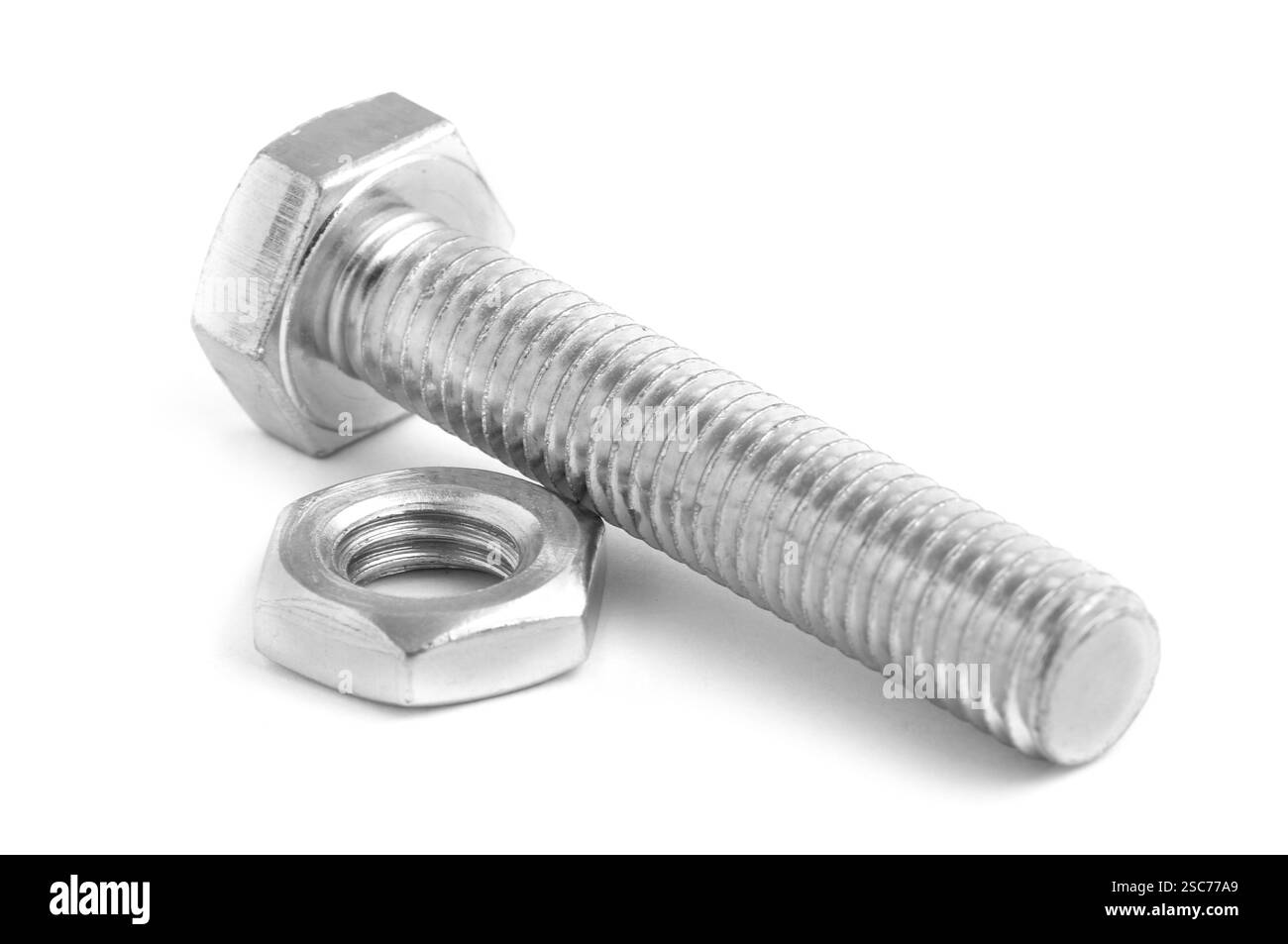 Stainless steel tap bolt with nut on white background Stock Photo - Alamy