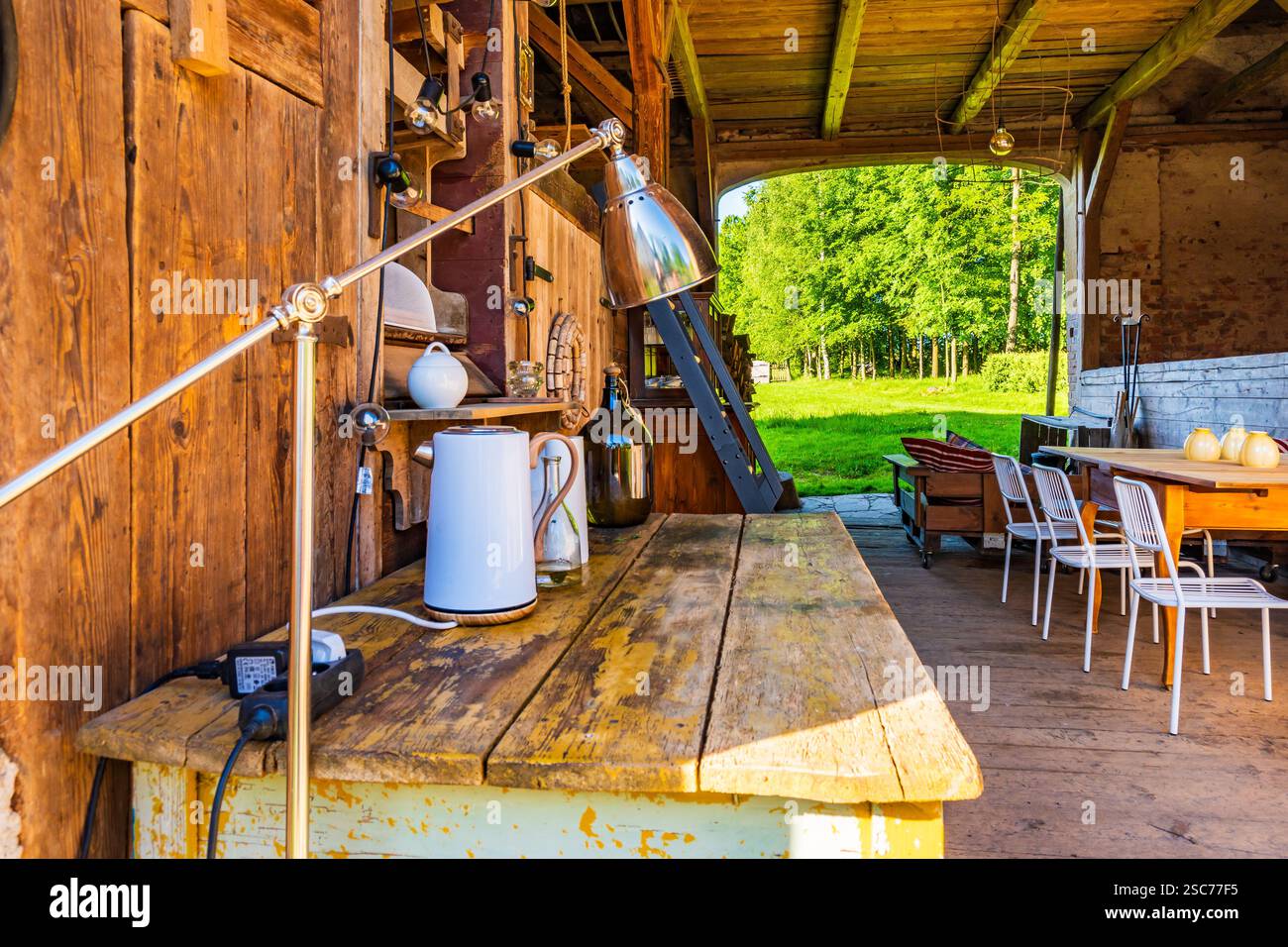 Interior view of rustic old farm house barn on sunny summer day ...