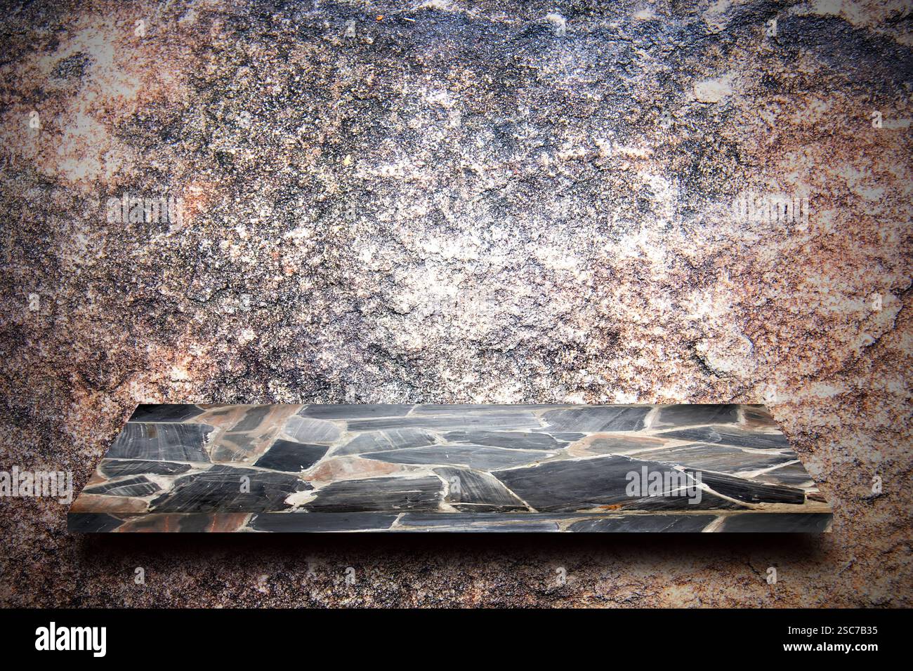 Empty top of natural stone shelves and stone wall background. For ...