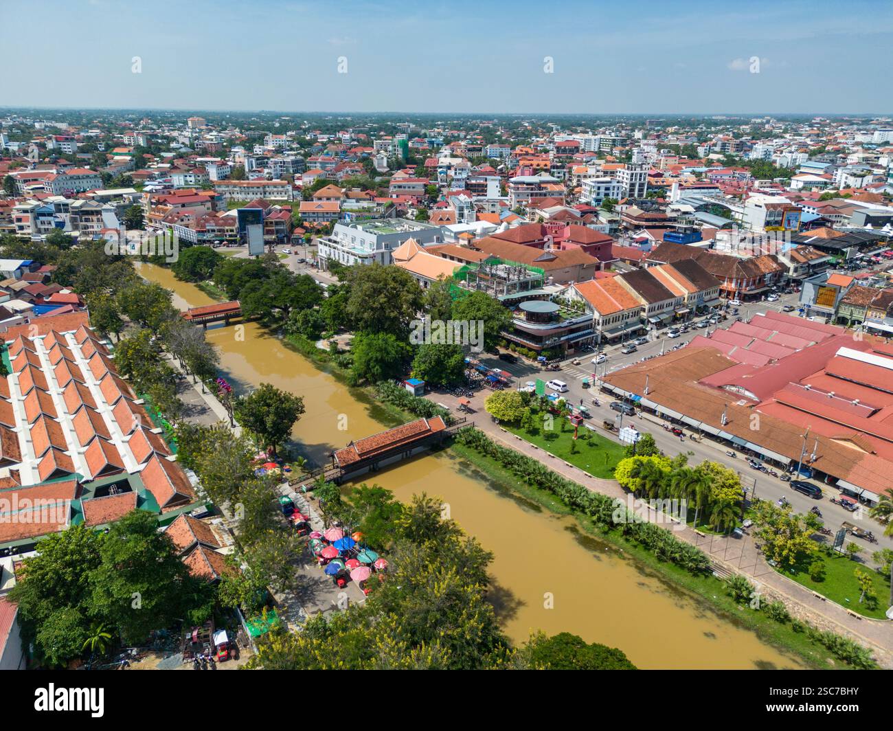 Aerial view of Siem Reap River flowing through the city center, Sala ...