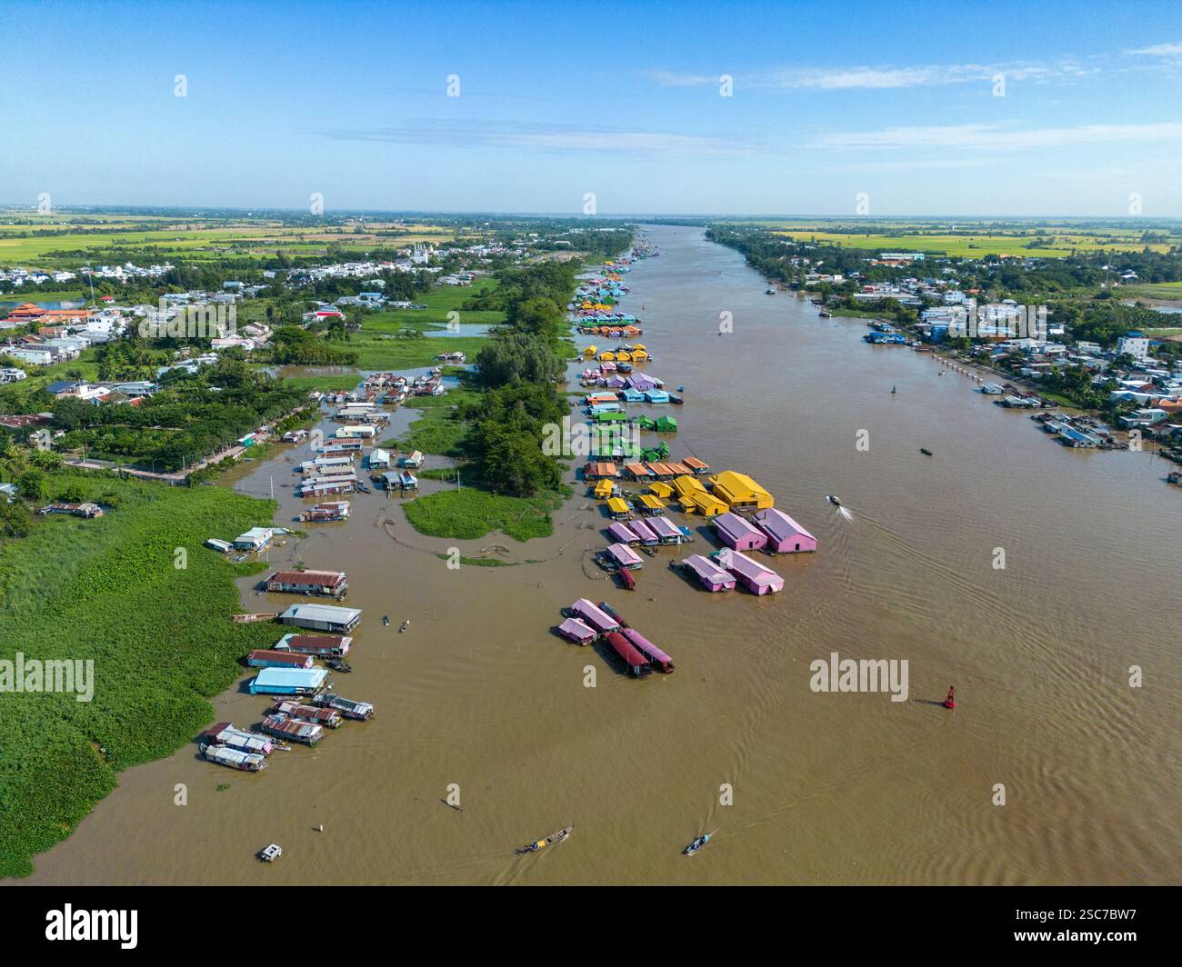 Aerial view of colorfully painted fish farms at Hau River (Bassac River ...