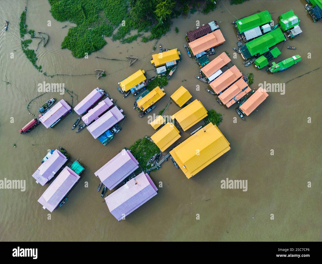 Aerial view of colorfully painted fish farms at Hau River (Bassac River ...