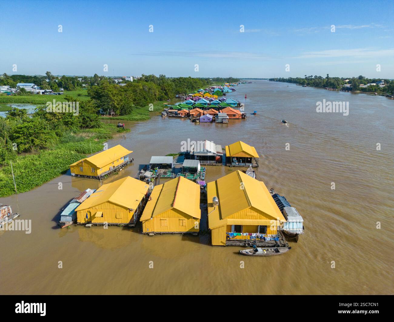 Aerial view of colorfully painted fish farms at Hau River (Bassac River ...
