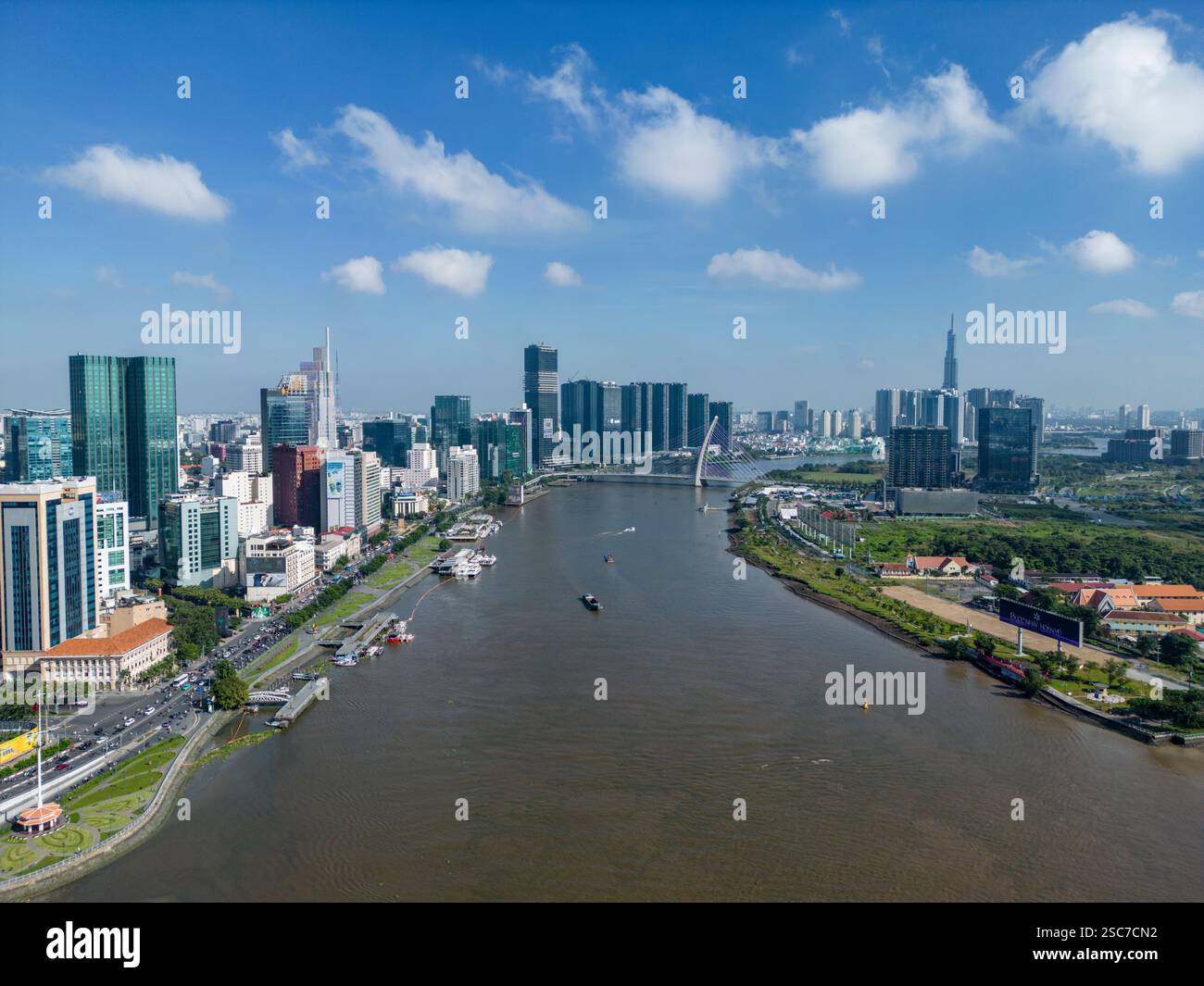 Aerial view of Saigon River with city skyline and Landmark 81 tower in ...