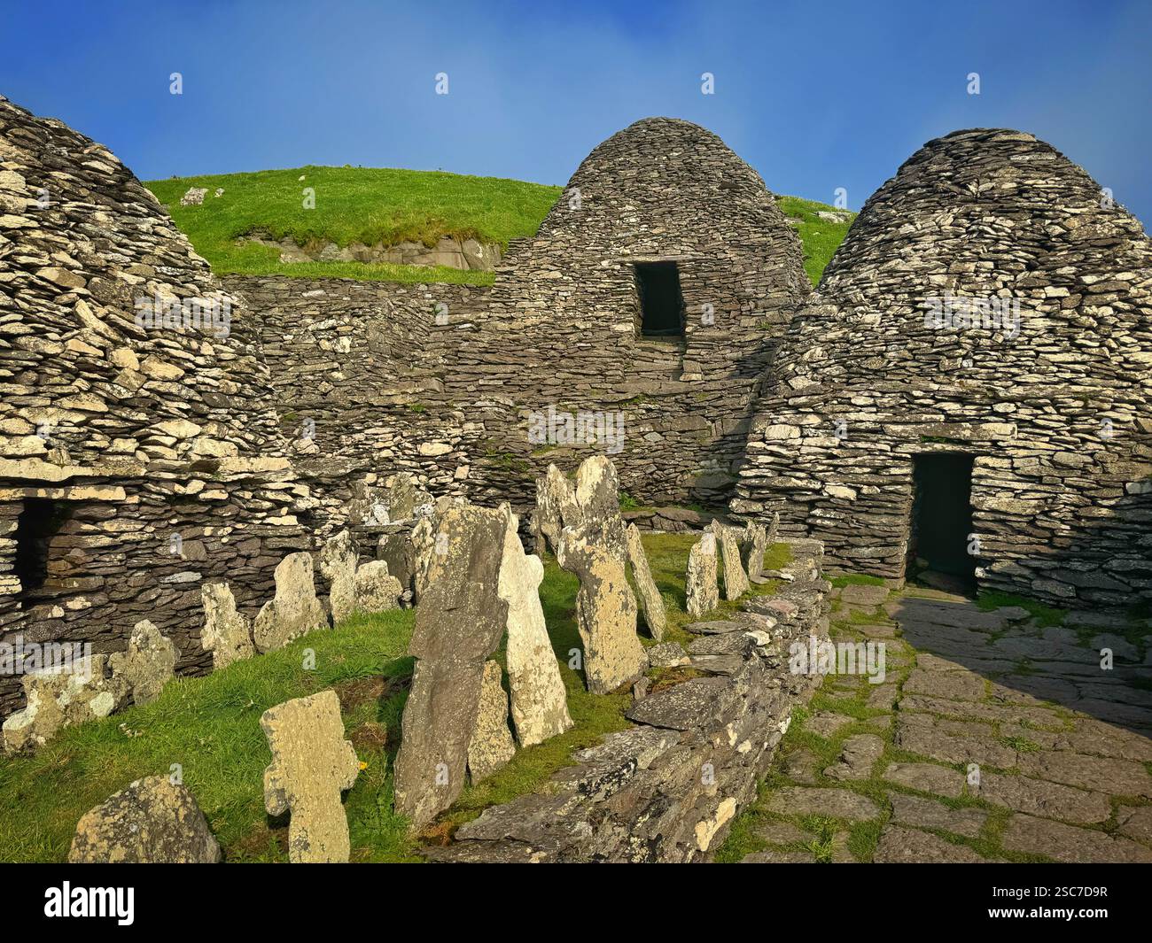 Monks graveyard with beehive monastic cells on Skellig Michael, County ...