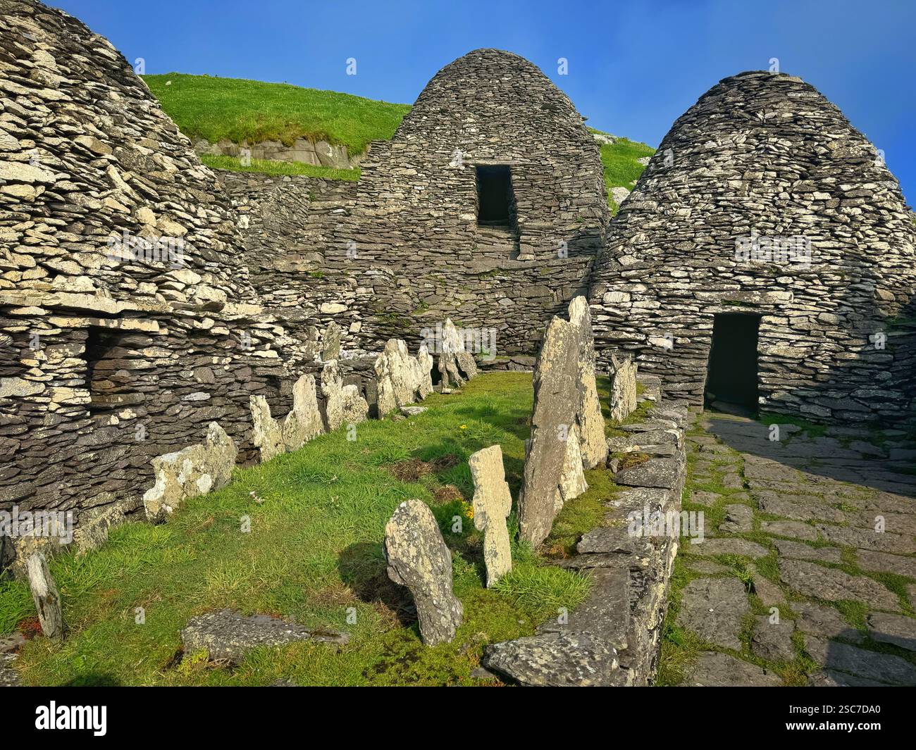 Monks graveyard with beehive monastic cells on Skellig Michael, County ...