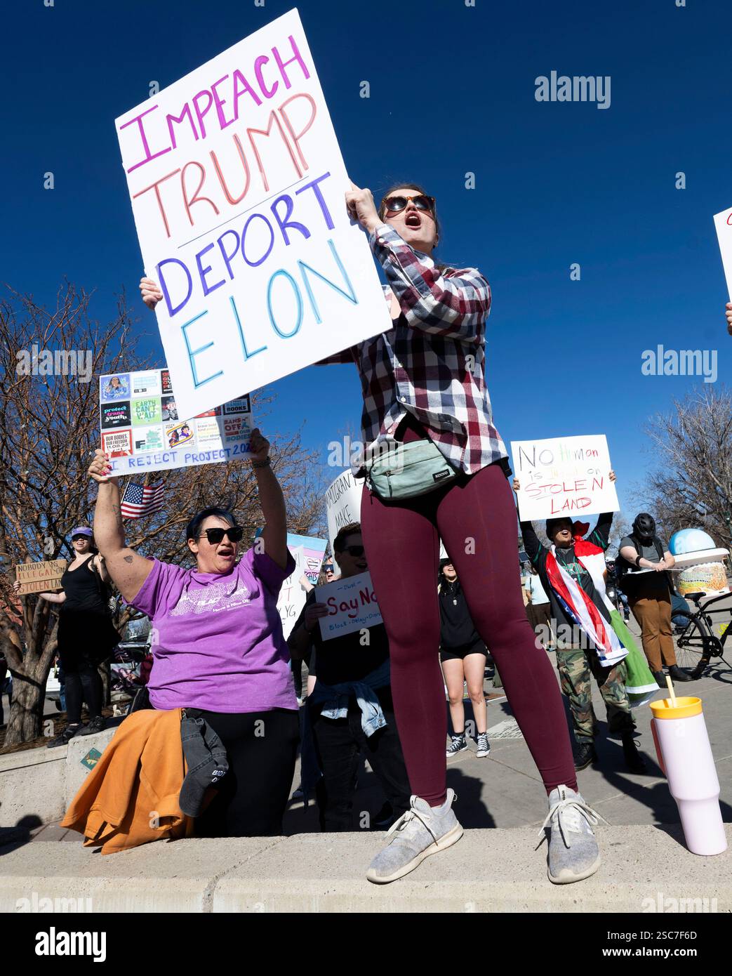 Chanda Waldenmaier and dozens of other protesters rally in Acacia Park ...