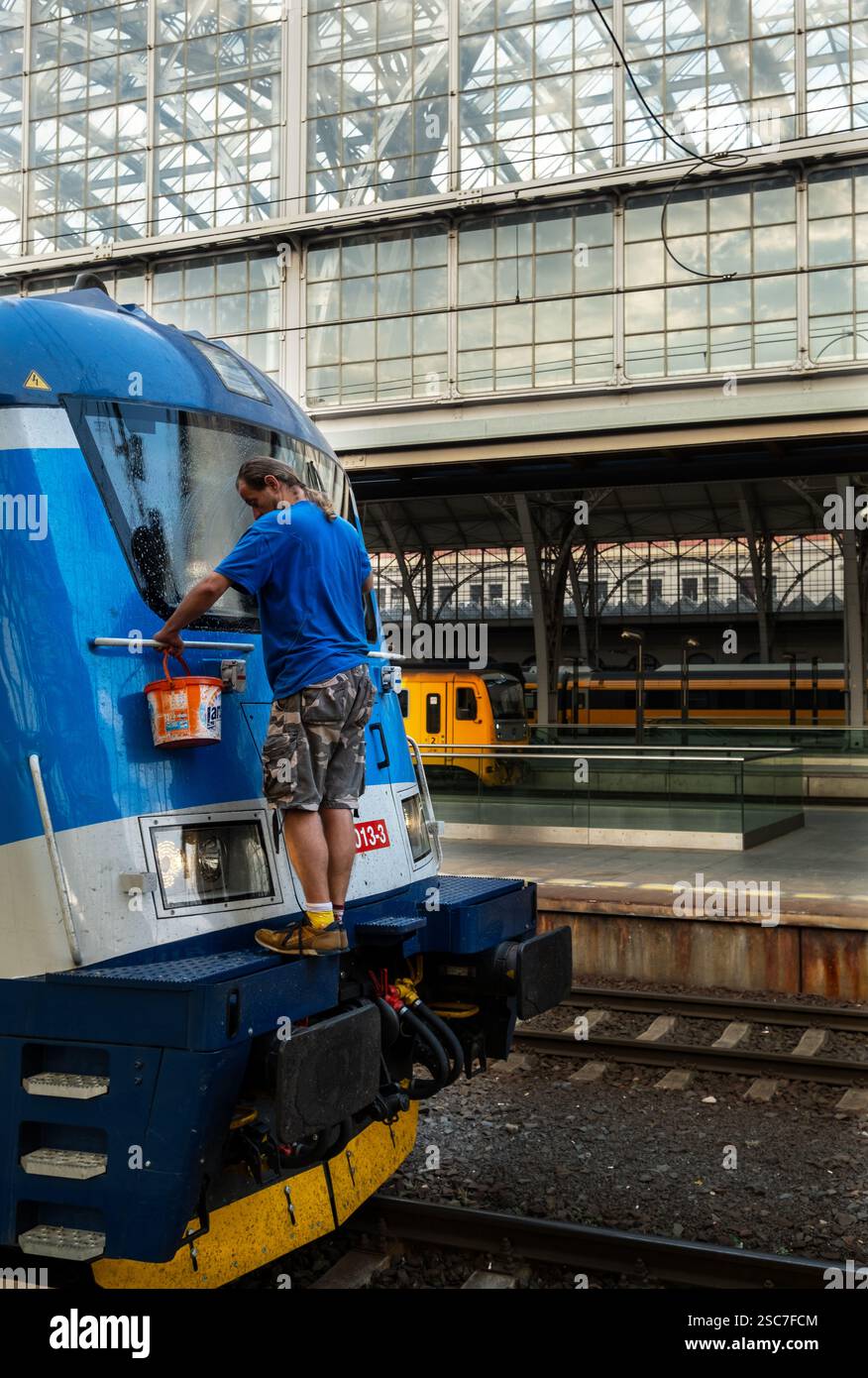 05.09.2024, Czech Republic, Prague, Prague - Engine driver cleaning the ...