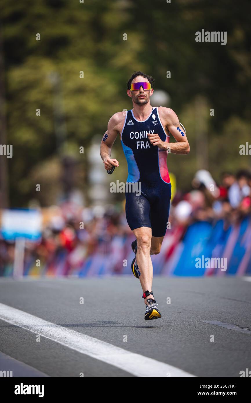 Dorian Coninx participating in the triathlon at the Paris 2024 Olympic ...