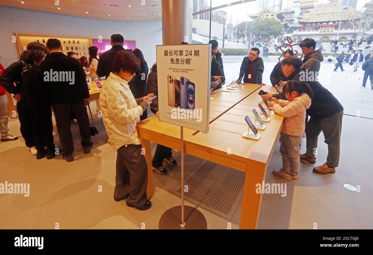 SHANGHAI, CHINA - FEBRUARY 4, 2025 - Customers experience an iphone 16 ...