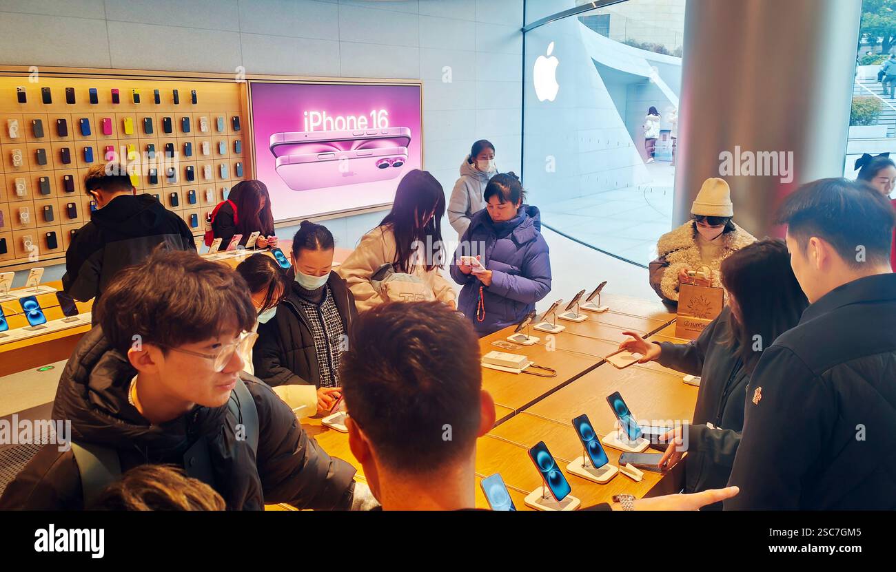 SHANGHAI, CHINA - FEBRUARY 4, 2025 - Customers experience an iphone 16 ...