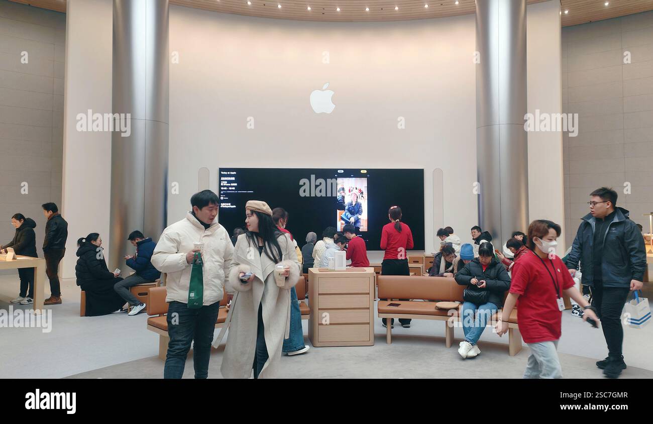 SHANGHAI, CHINA - FEBRUARY 4, 2025 - Customers experience an iphone 16 ...