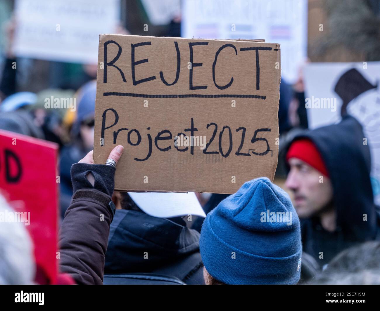 New York, New York, USA. 5th Feb, 2025. A hand in the crowd holds a ...