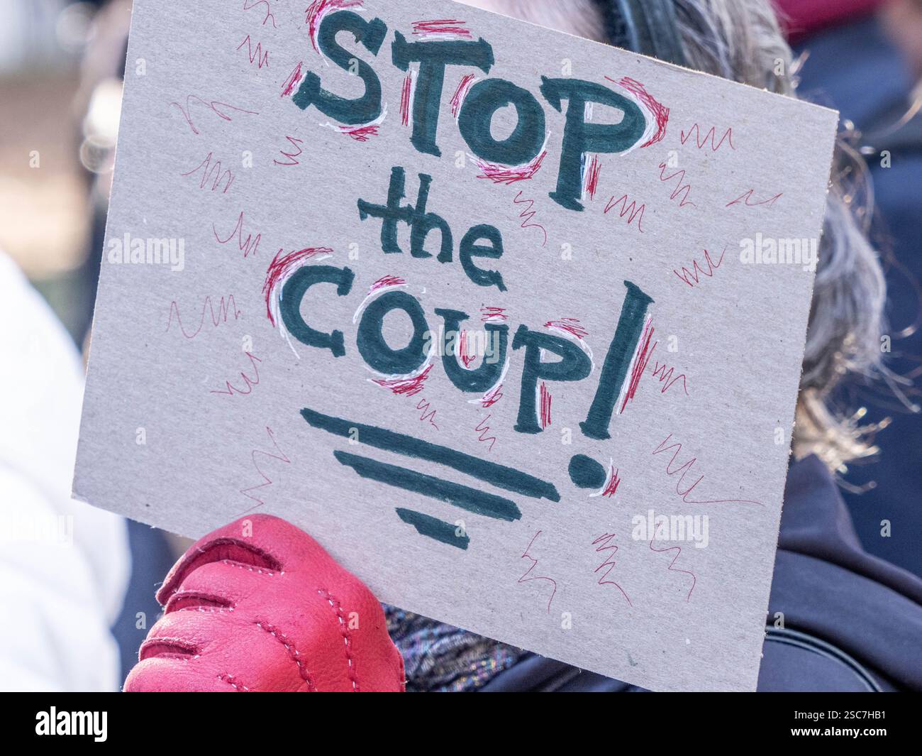 New York, New York, USA. 5th Feb, 2025. A hand in the crowd holds a ...