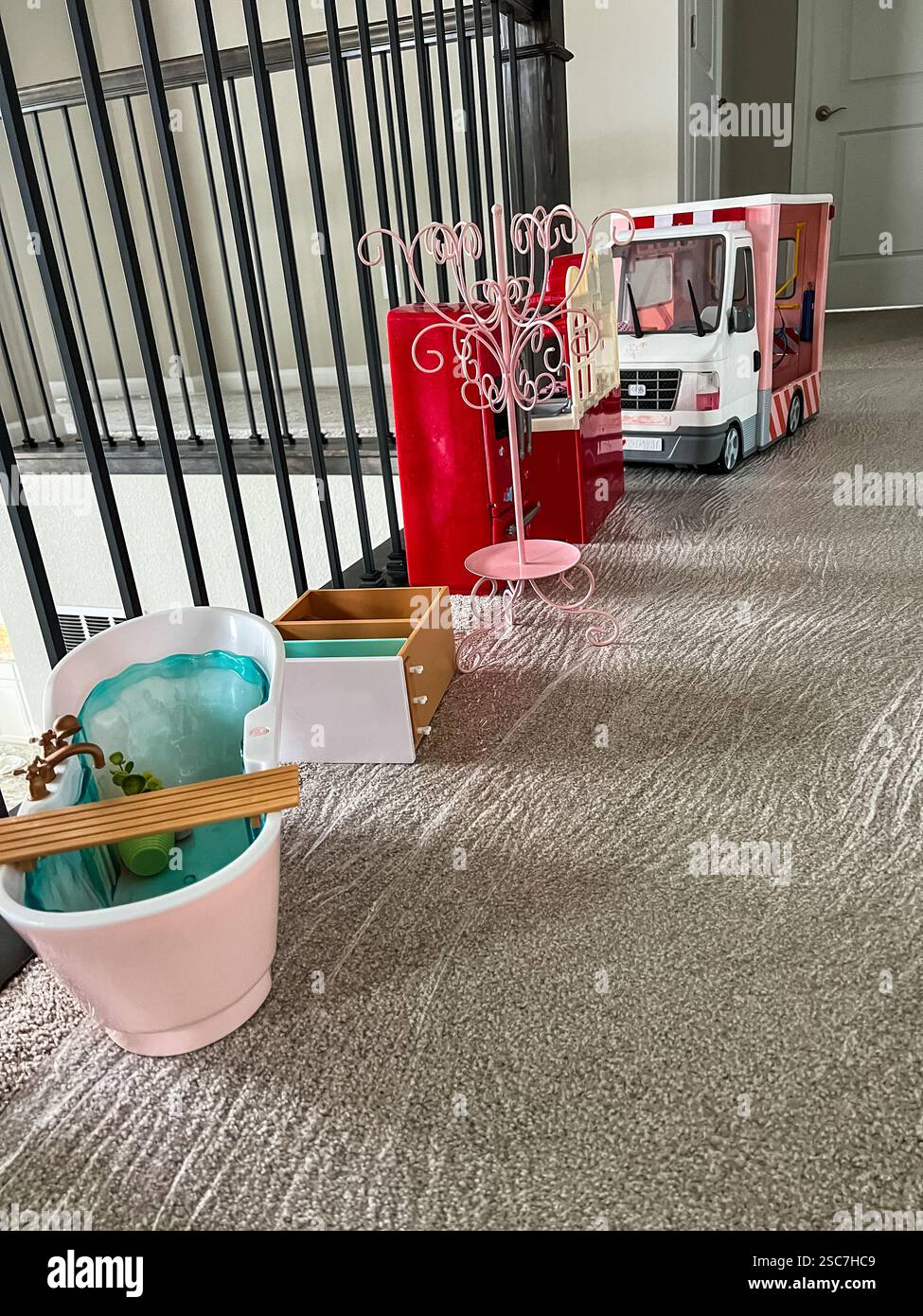 Assorted doll furniture and accessories on carpet Stock Photo - Alamy