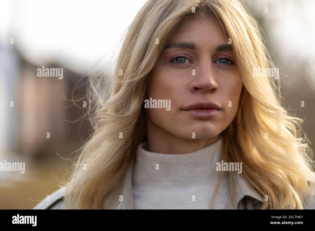 Warm sunlight illuminates woman wearing hi-res stock photography and ...