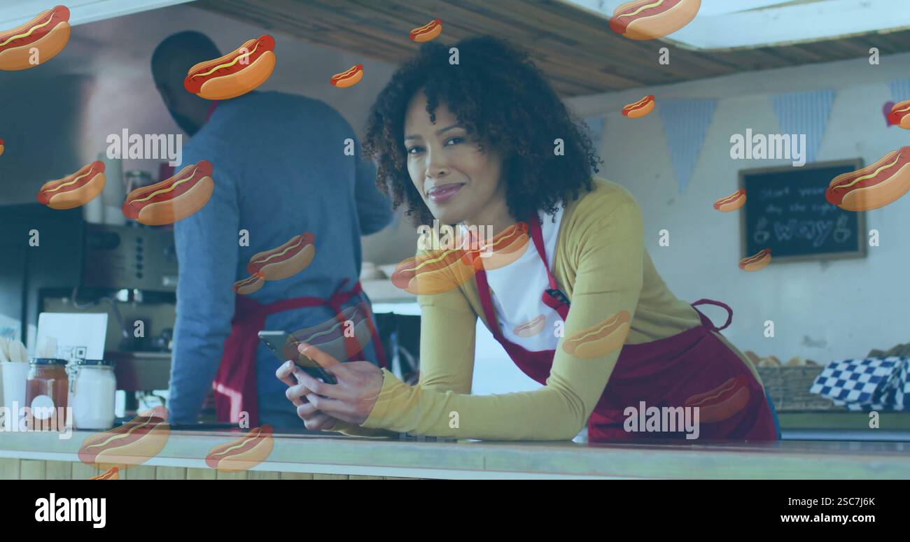Hot dog image over woman using smartphone in food truck Stock Photo - Alamy
